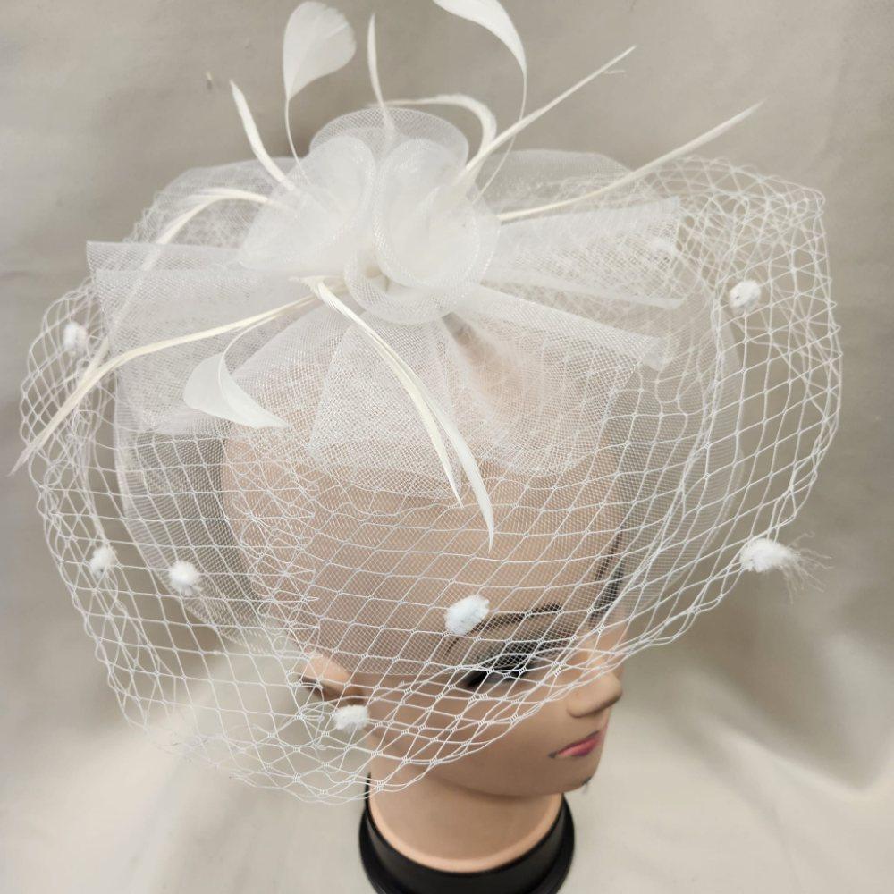 Fascinator Hats or Fascinators Classic fascinator in purple with veil ...